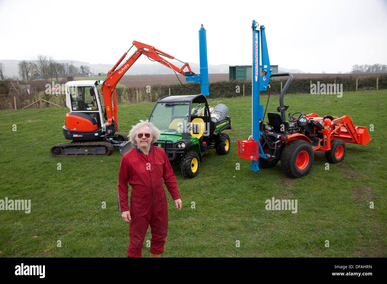 Workmen ready to create a fence using a Post Punching Machine UK Stock ...