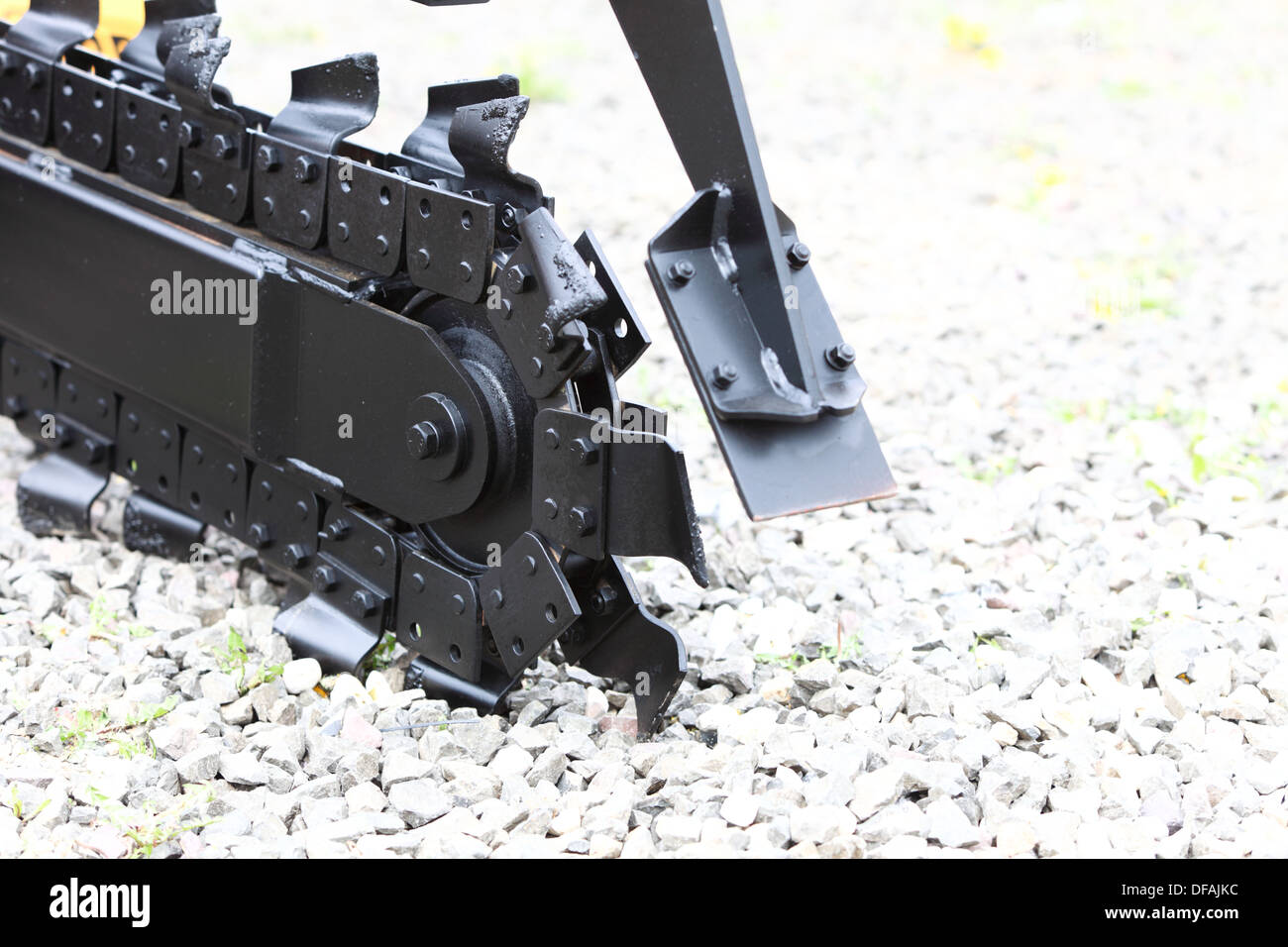 Trench digger industry detail machine for trenching Stock Photo - Alamy