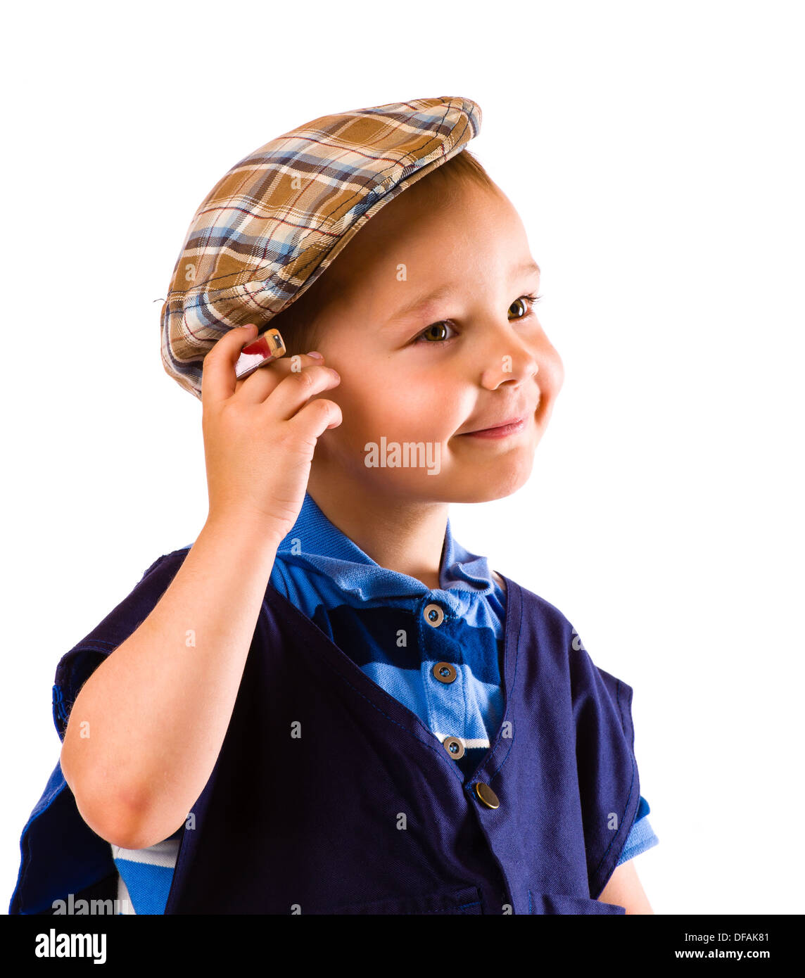 Little boy keeps carpenter pen behind the ears, white background Stock ...