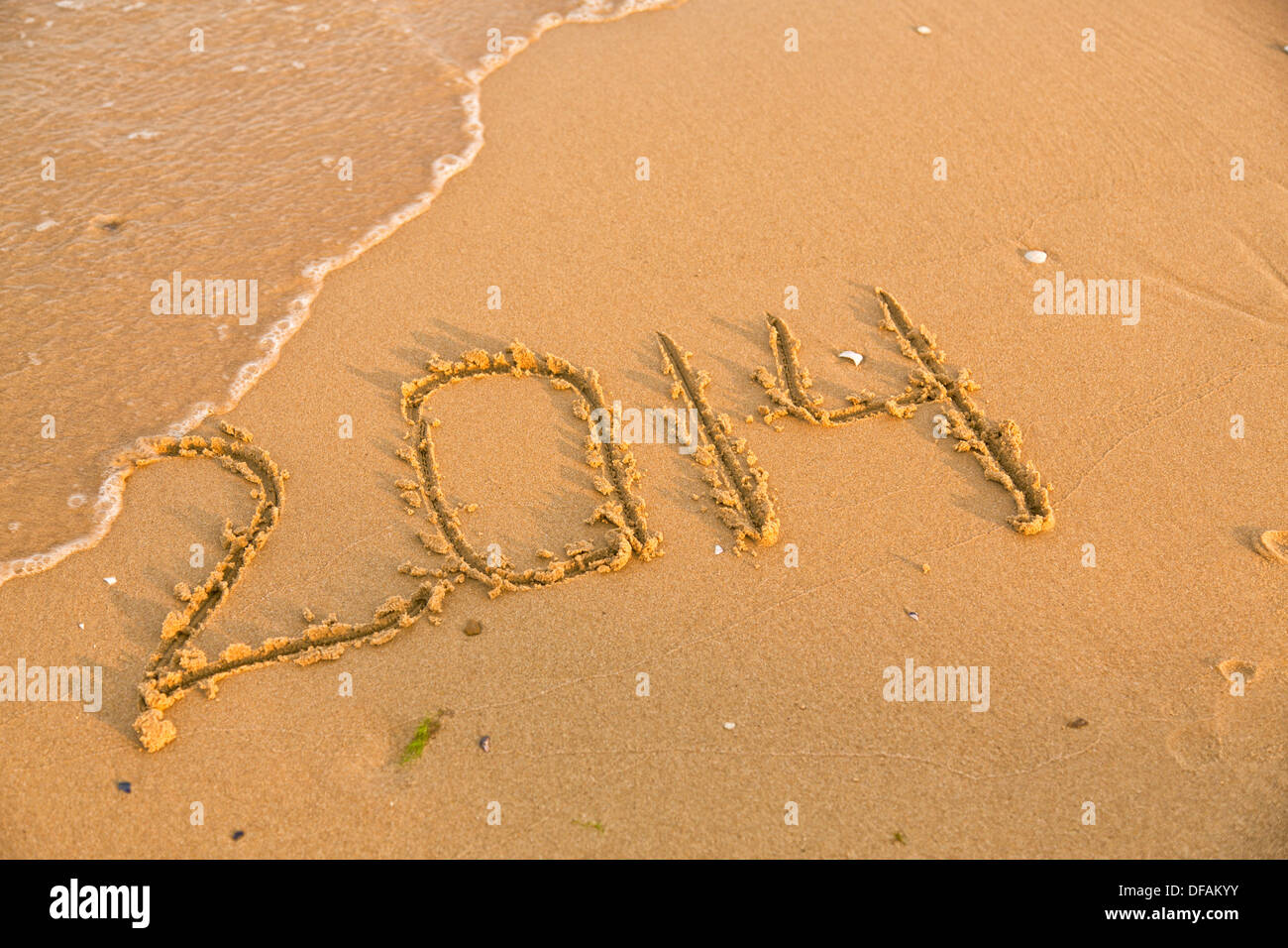 2014 numbers on the yellow sandy beach hi-res stock photography and ...