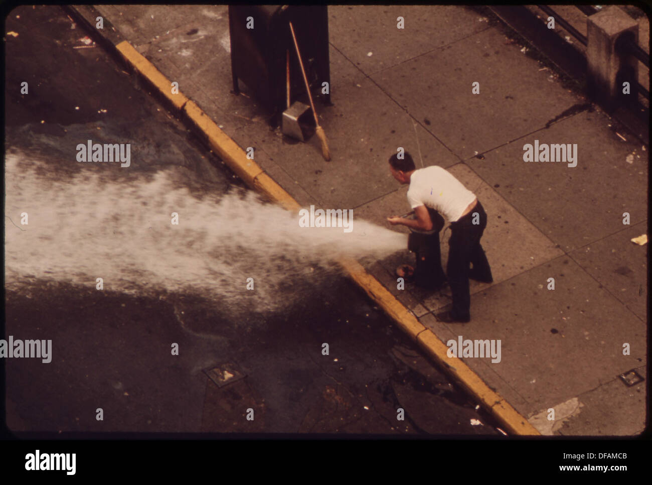 A photograph showing a fire hydrant flushing litter off 172nd Street ...
