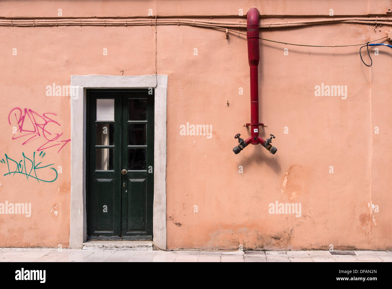 Graffiti, door and fire hydrant, Greece Stock Photo - Alamy