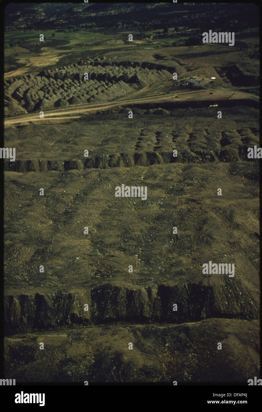 This aerial photograph shows a strip coal mining operation by Peabody ...