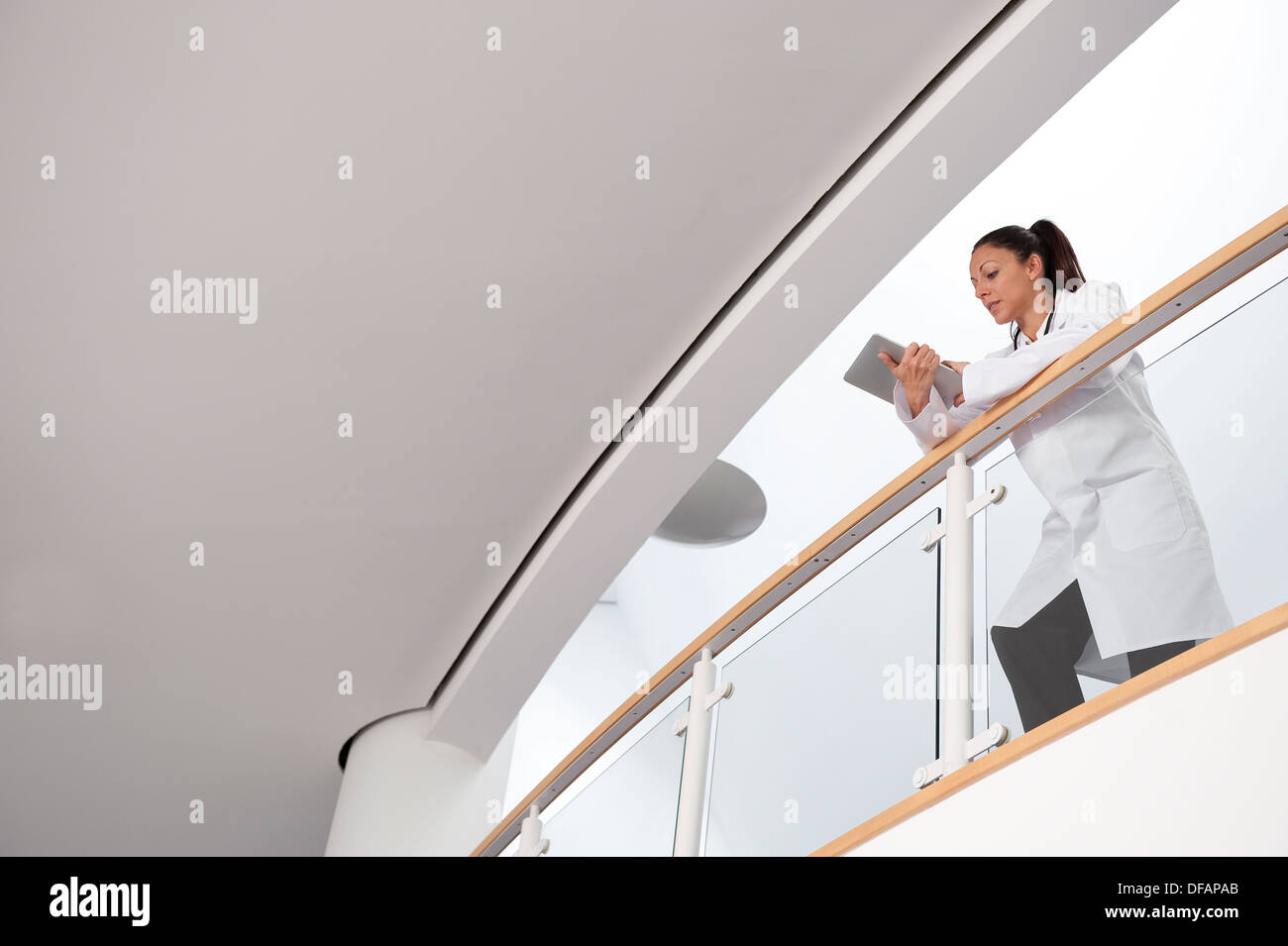 Doctor holding ipad hi-res stock photography and images - Alamy