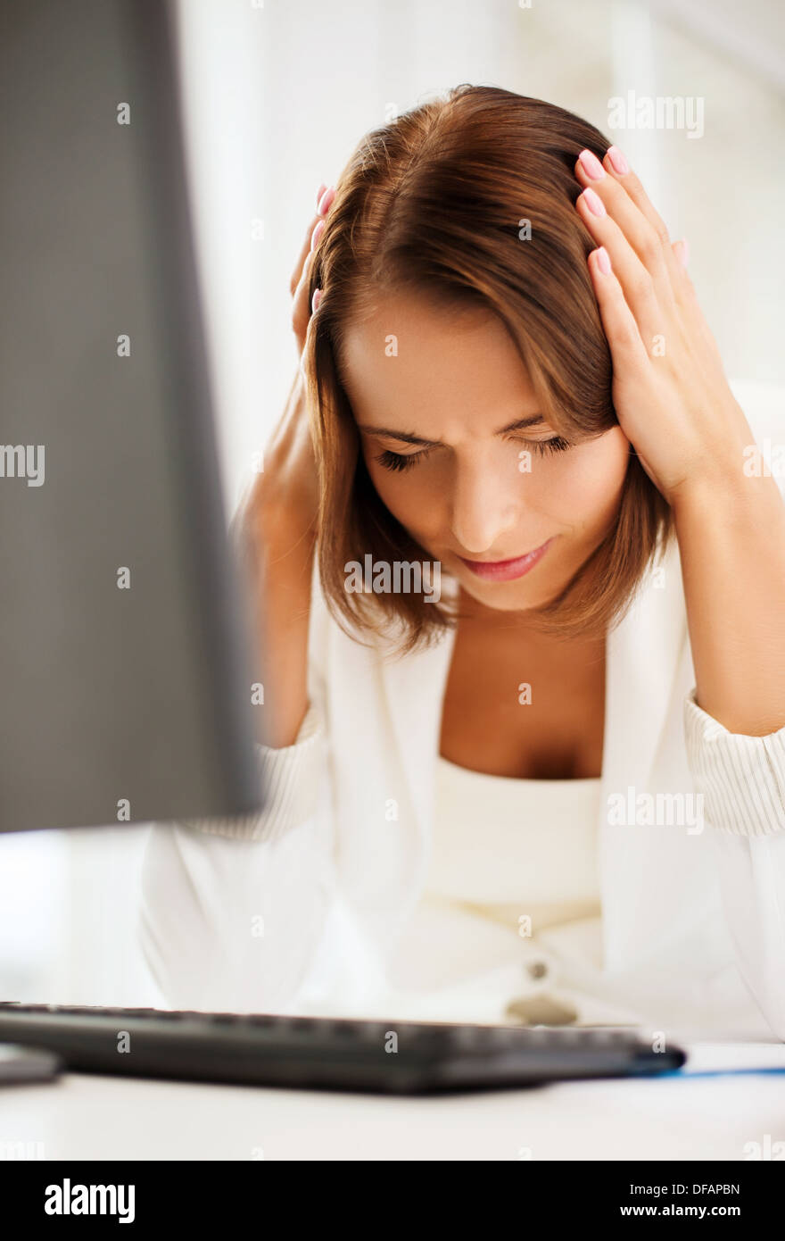 stressed woman with computer Stock Photo - Alamy