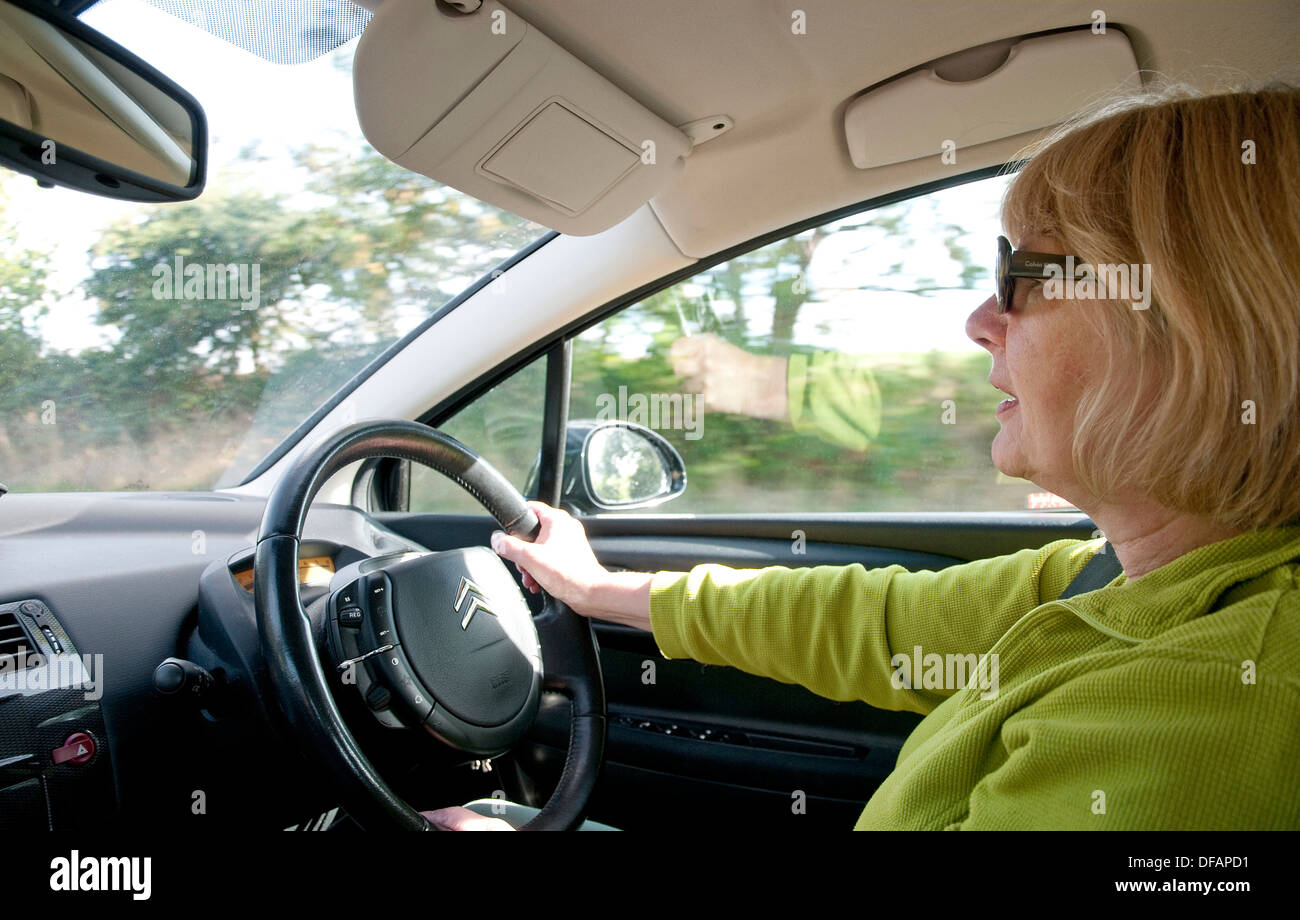 Mature Woman Driving Car Stock Photos & Mature Woman Driving Car Stock ...