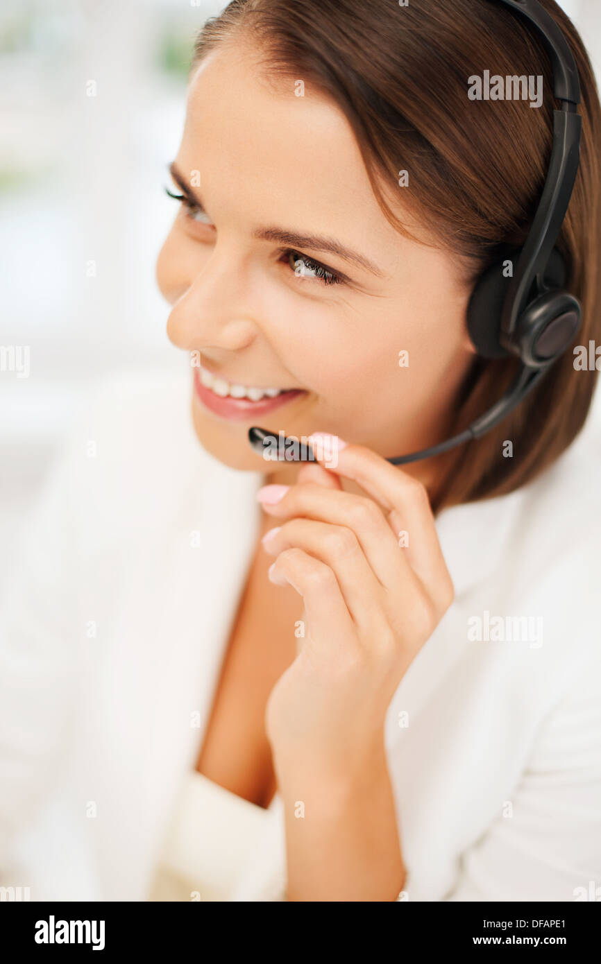 female helpline operator with headphones Stock Photo - Alamy