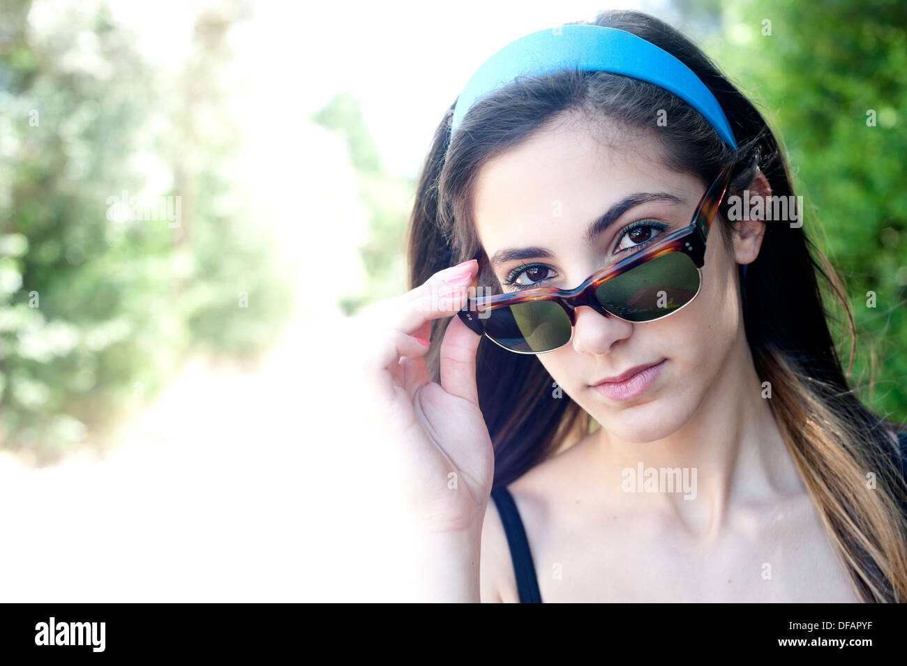 Teenage girl with sunglasses Stock Photo - Alamy