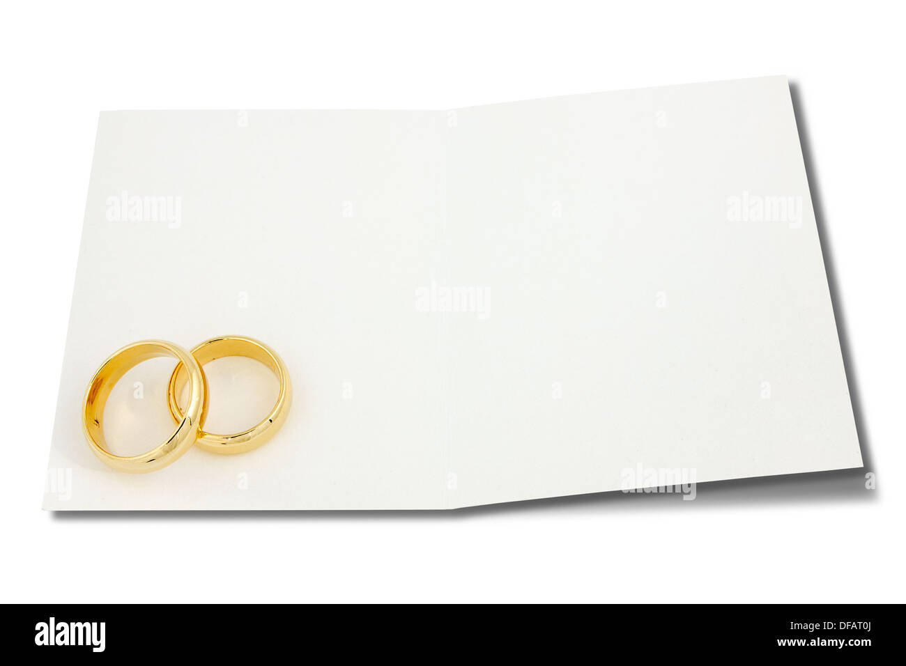 Wedding rings on the card for text over a white background Stock Photo ...
