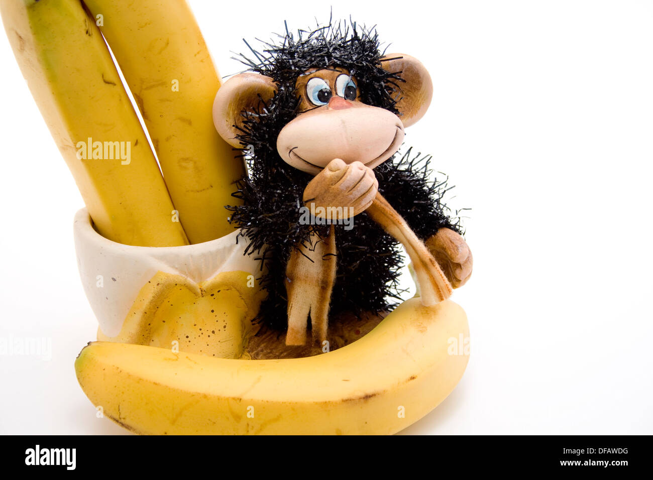 Monkey eating banana hi-res stock photography and images - Alamy