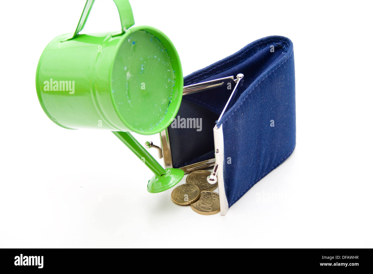 Money bag with watering can Stock Photo - Alamy