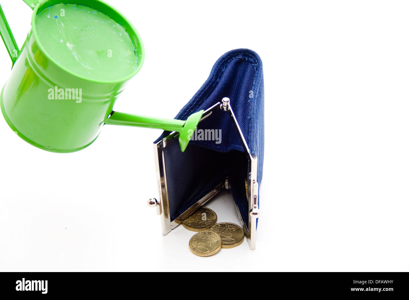 Money bag with watering can Stock Photo - Alamy