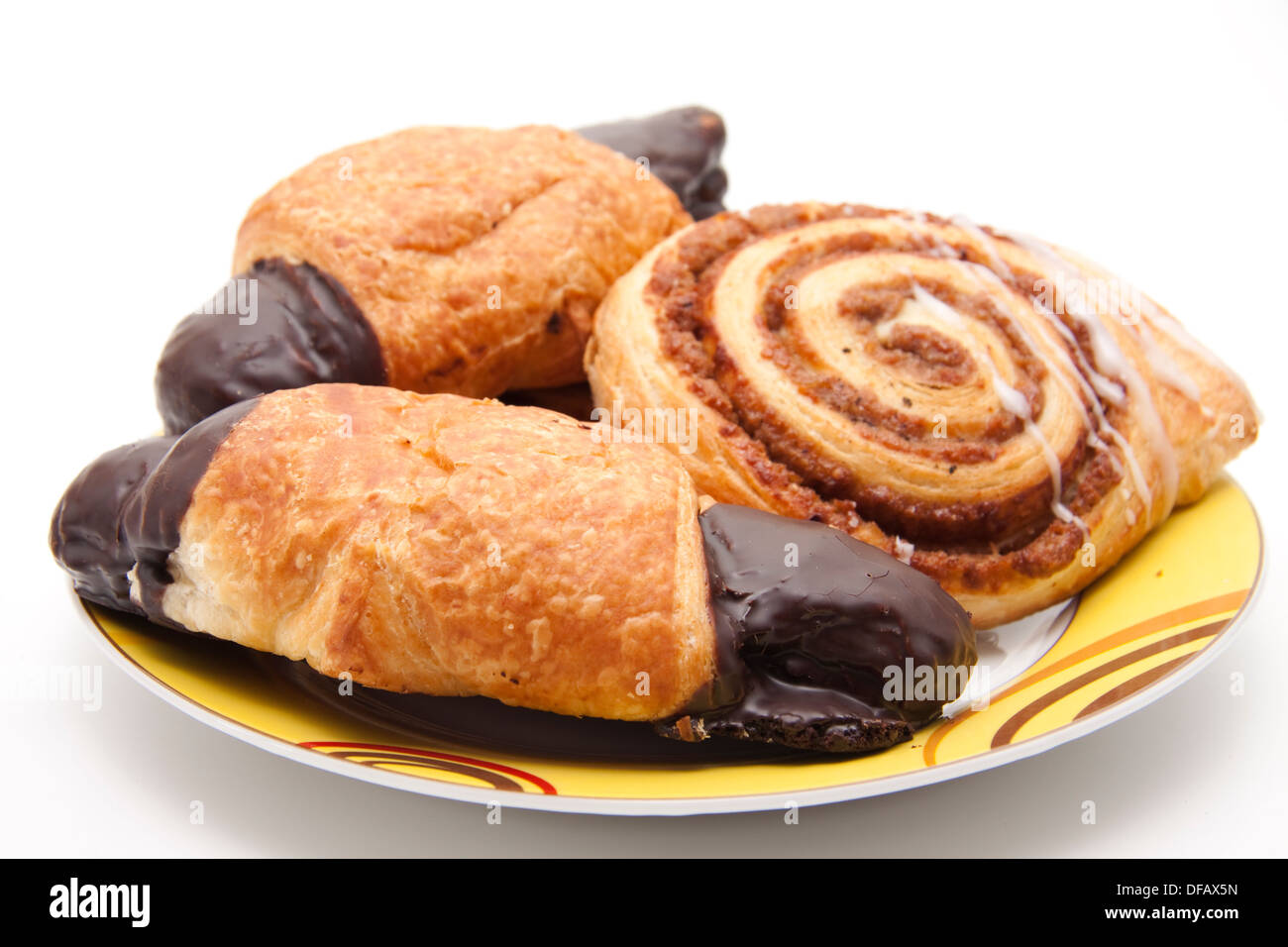 Nut escargot with chocolate little piece Stock Photo - Alamy