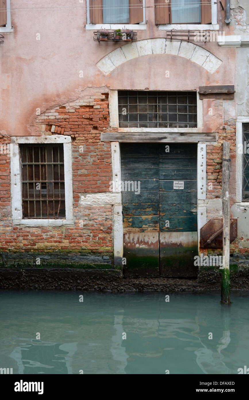Traditional building by canal. Venice Italy Stock Photo - Alamy
