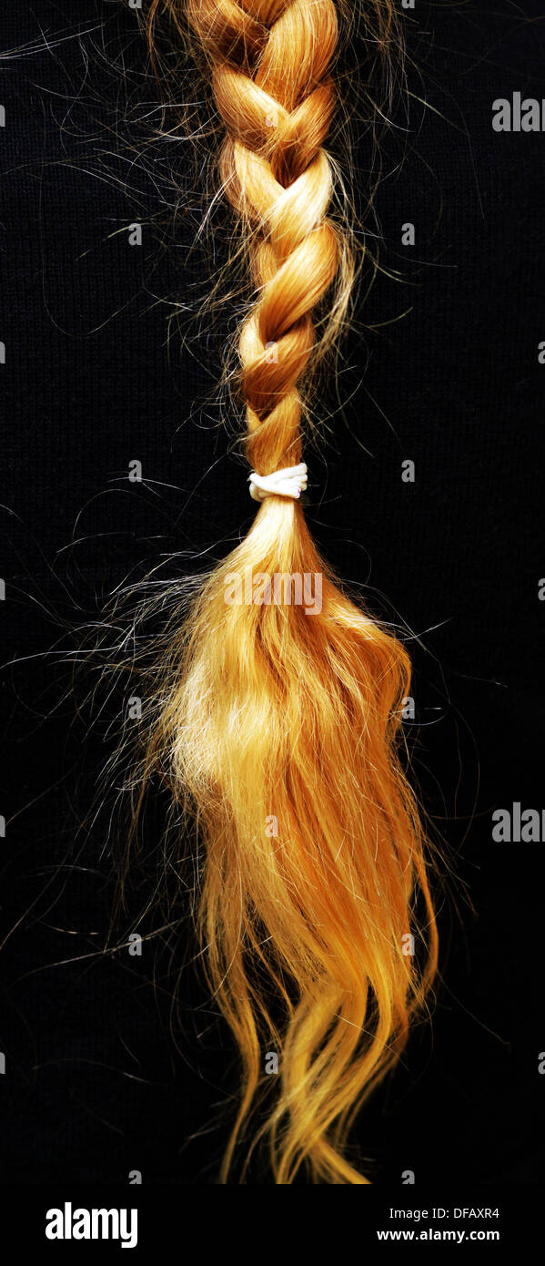 Girls plaited blonde hair Stock Photo - Alamy