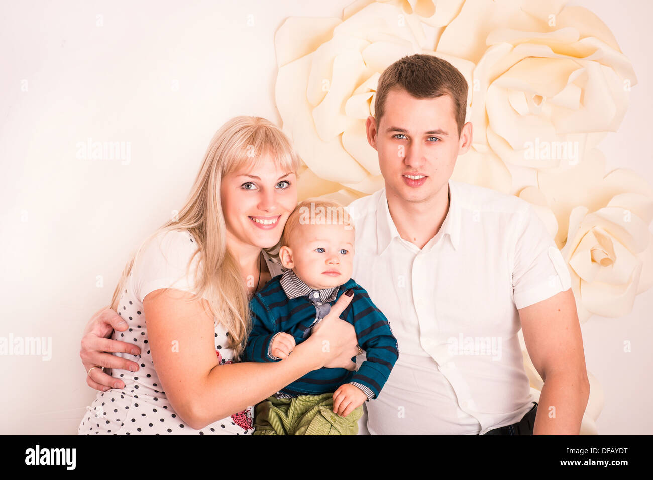 Portrait of a happy family: mother, father and a baby Stock Photo - Alamy