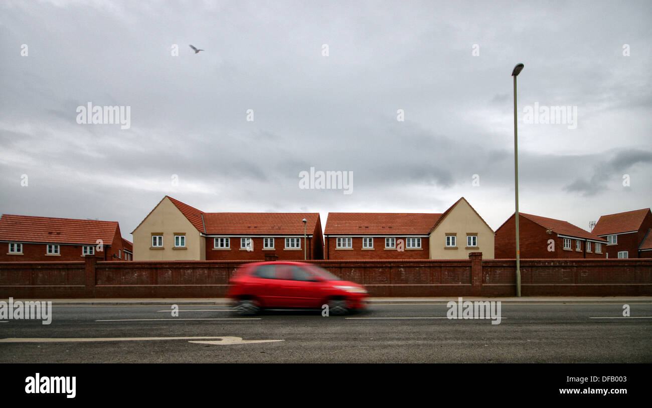 red car against modern houses Stock Photo - Alamy