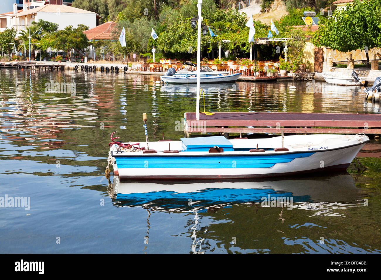 Geni Lefkada Lefkas small wooden rowing fishing traditional boat moored ...