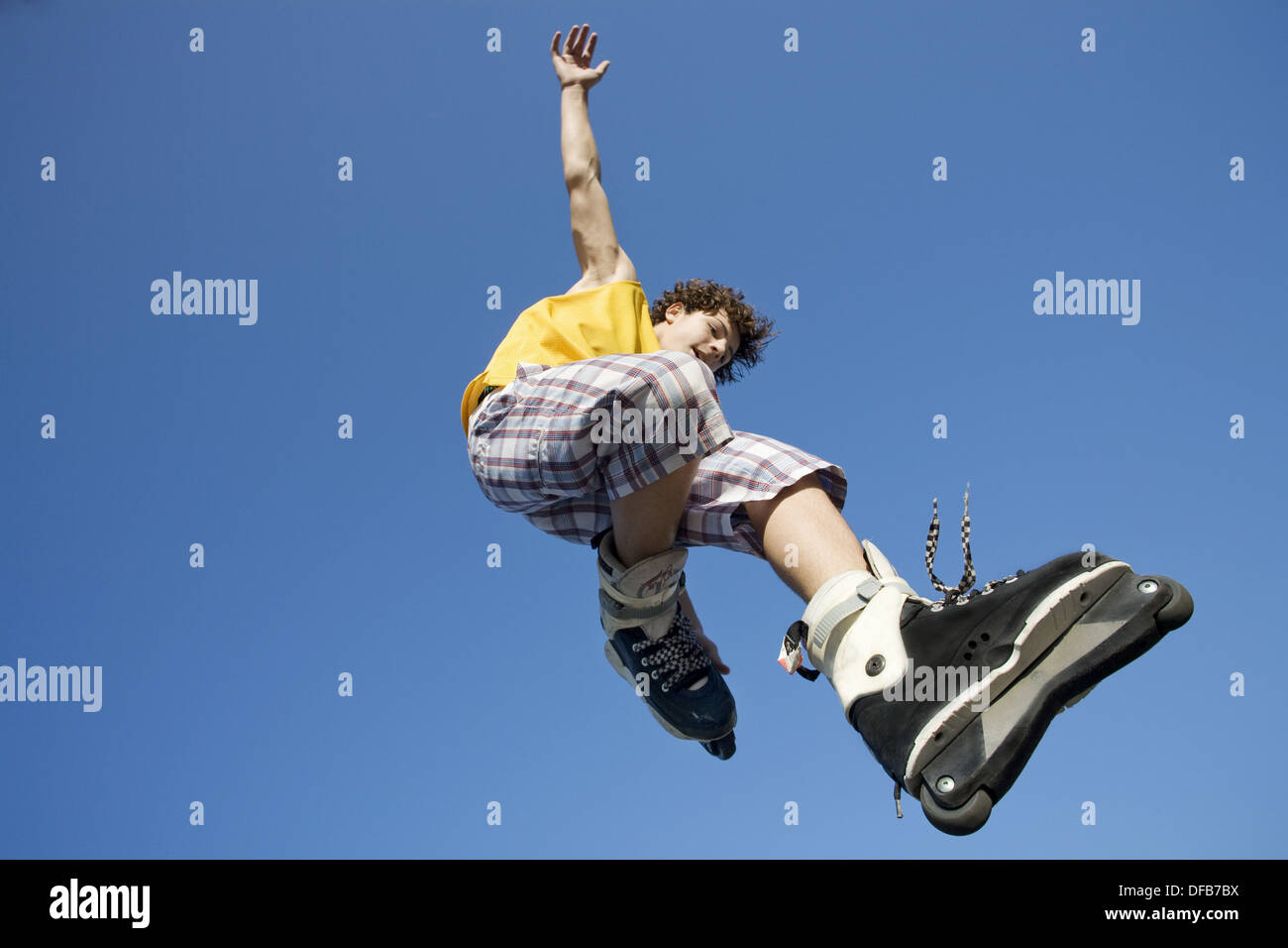 Teen jumping rollerblade hi-res stock photography and images - Alamy