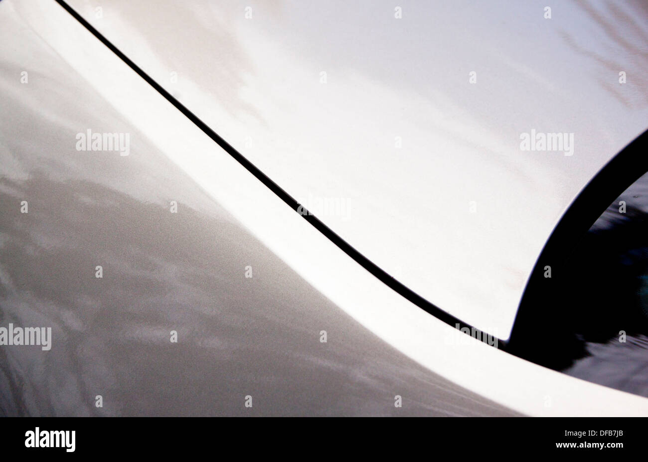 Abstract close up view of vehicles rear panel boot and rear windscreen ...