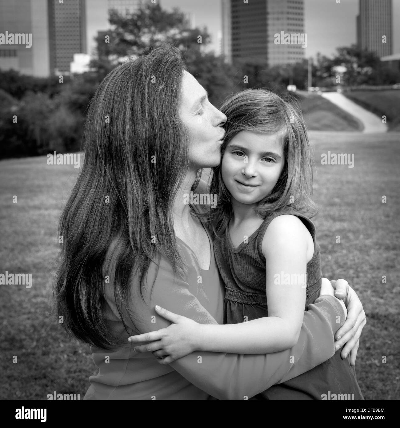 Mother daughter kiss Black and White Stock Photos & Images - Alamy