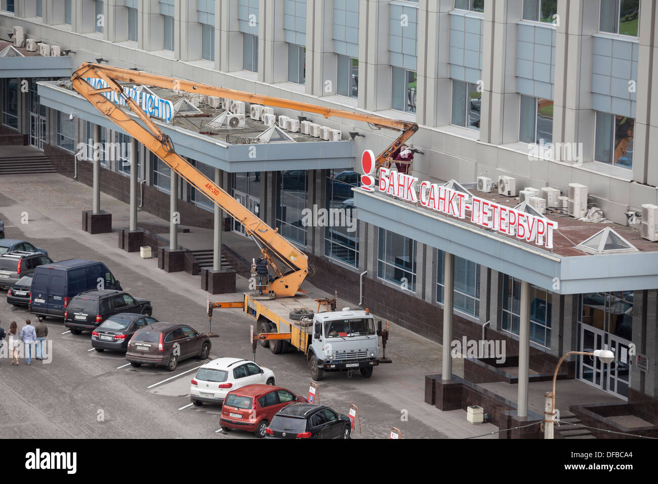 Car for lifting window washers on altitude in work. Saint-Petersburg ...