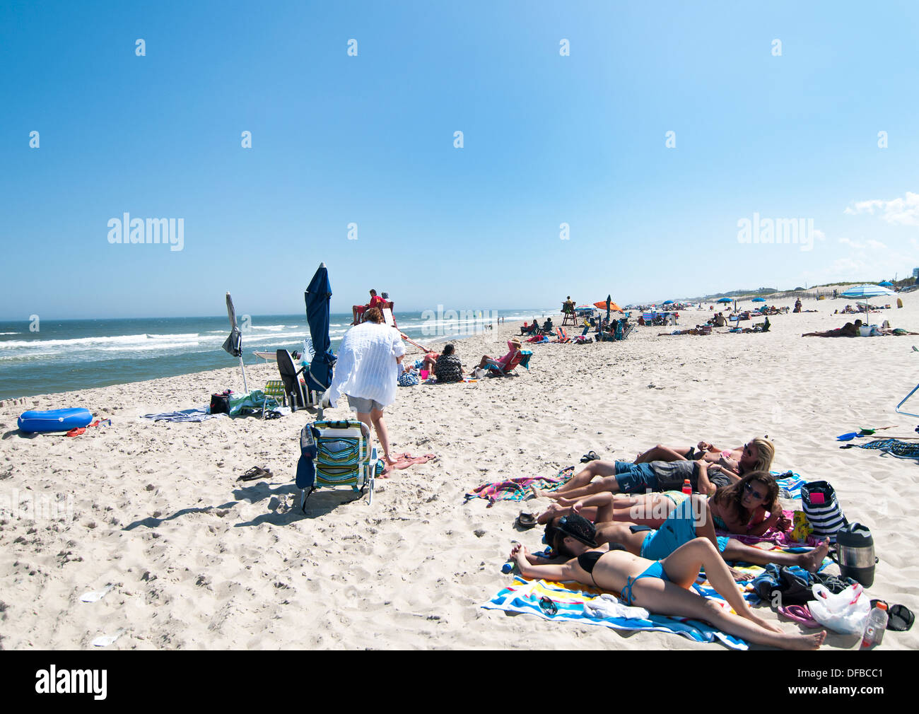 Sunbathing on beautiful long beach hi-res stock photography and images ...