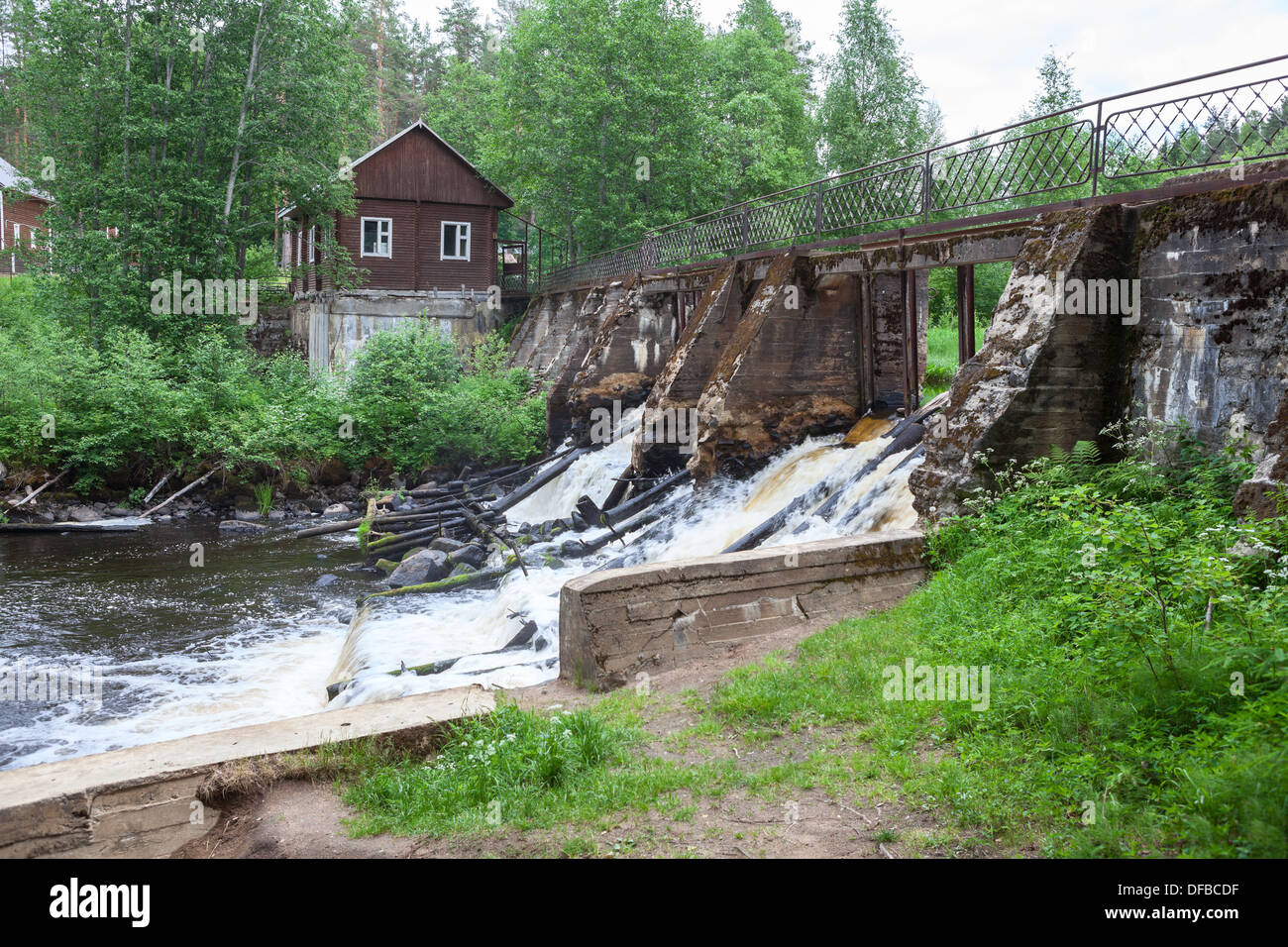 The old destroyed dam on the river, the flow of water through the ...