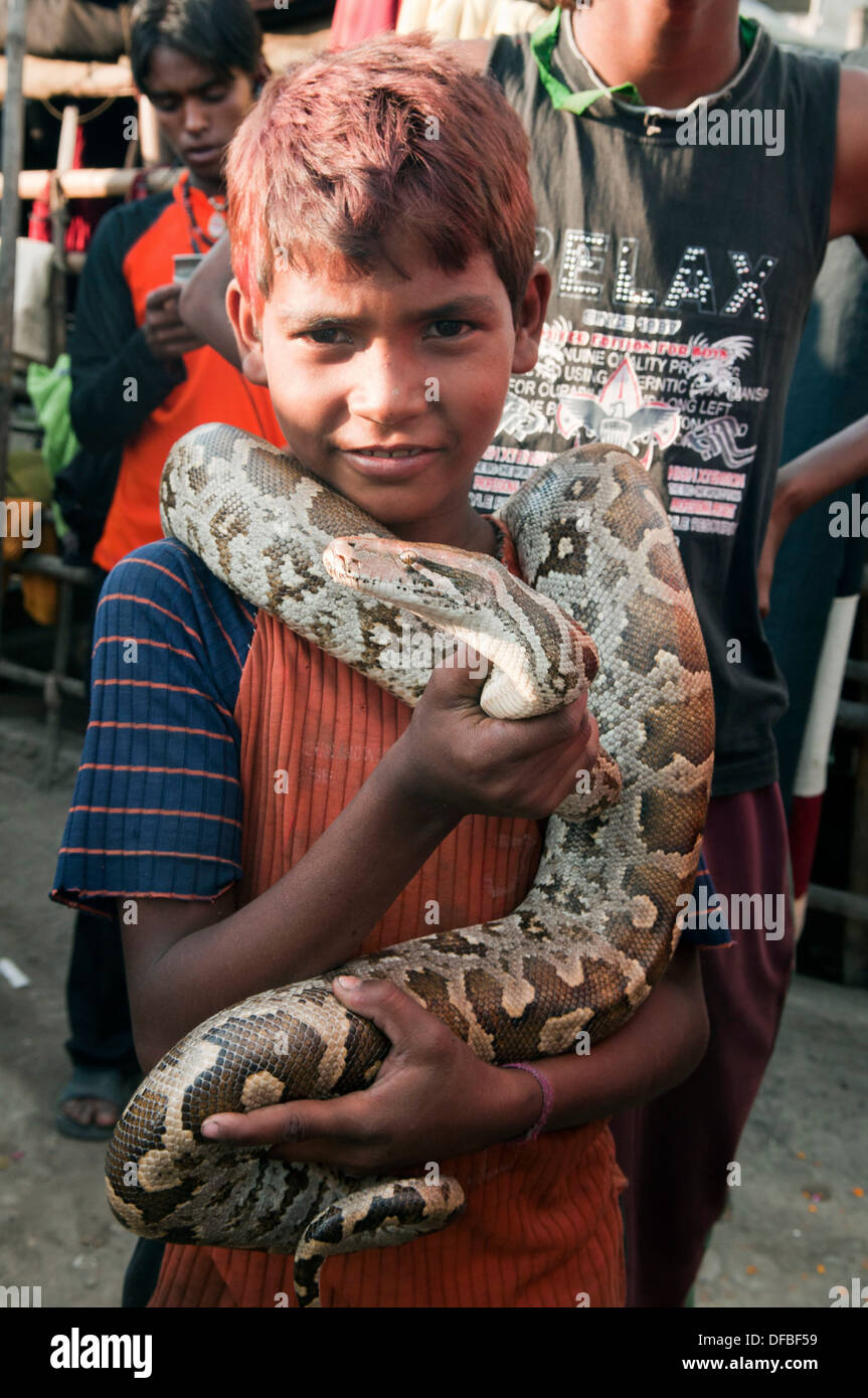 Boy with snake in hi-res stock photography and images - Alamy