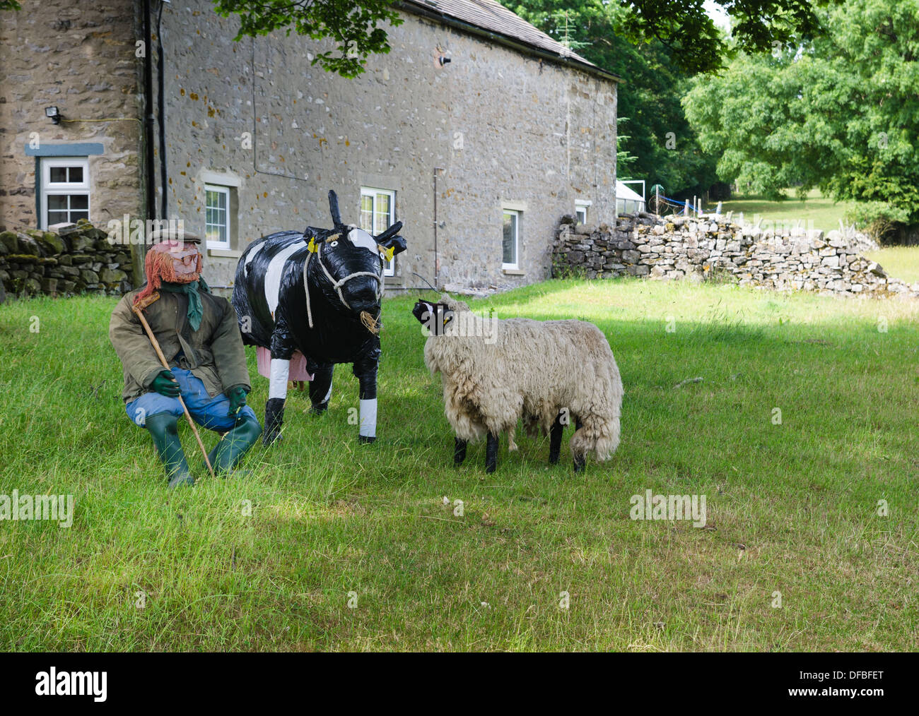 Scarecrow people and animals Stock Photo - Alamy