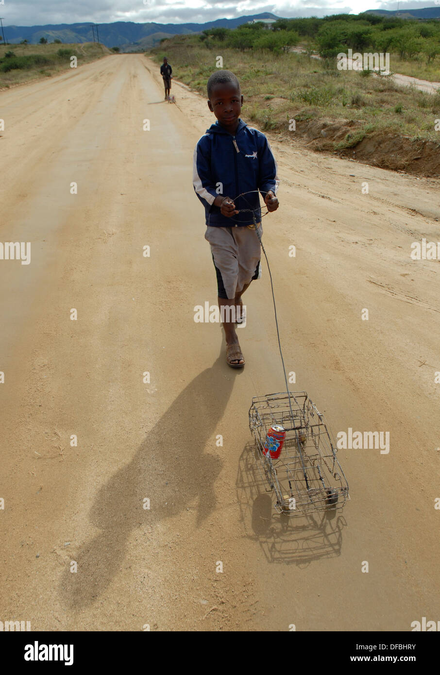 Boys play with wire cars near home South African President Jacob Zuma ...