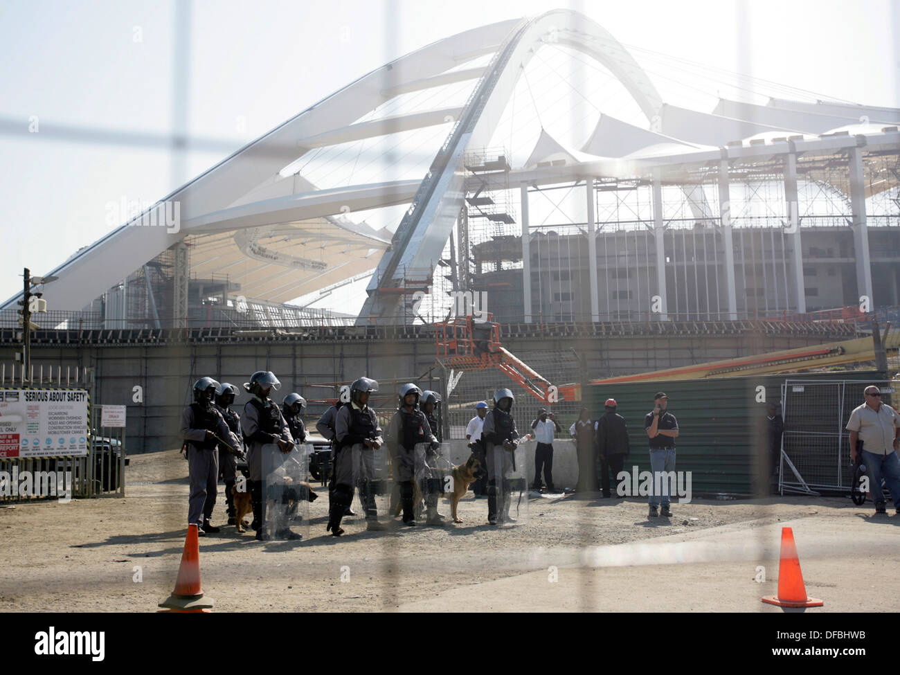 Private security guards in riot gear and armed with pepper guns keep ...