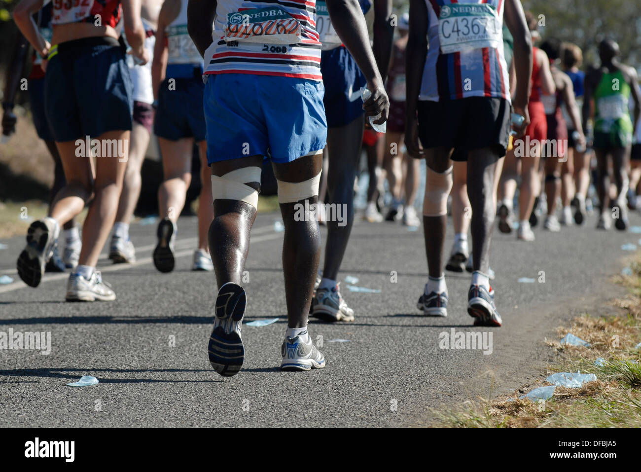 Runners climb a hill through Camperdown during Comrades Marathon June ...