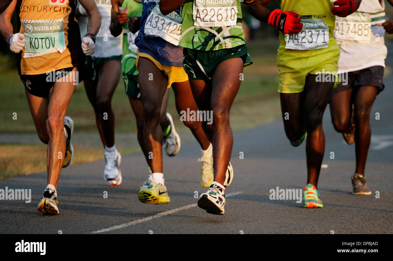 Runners pass through Camperdown dawn during Comrades Marathon May 24 ...
