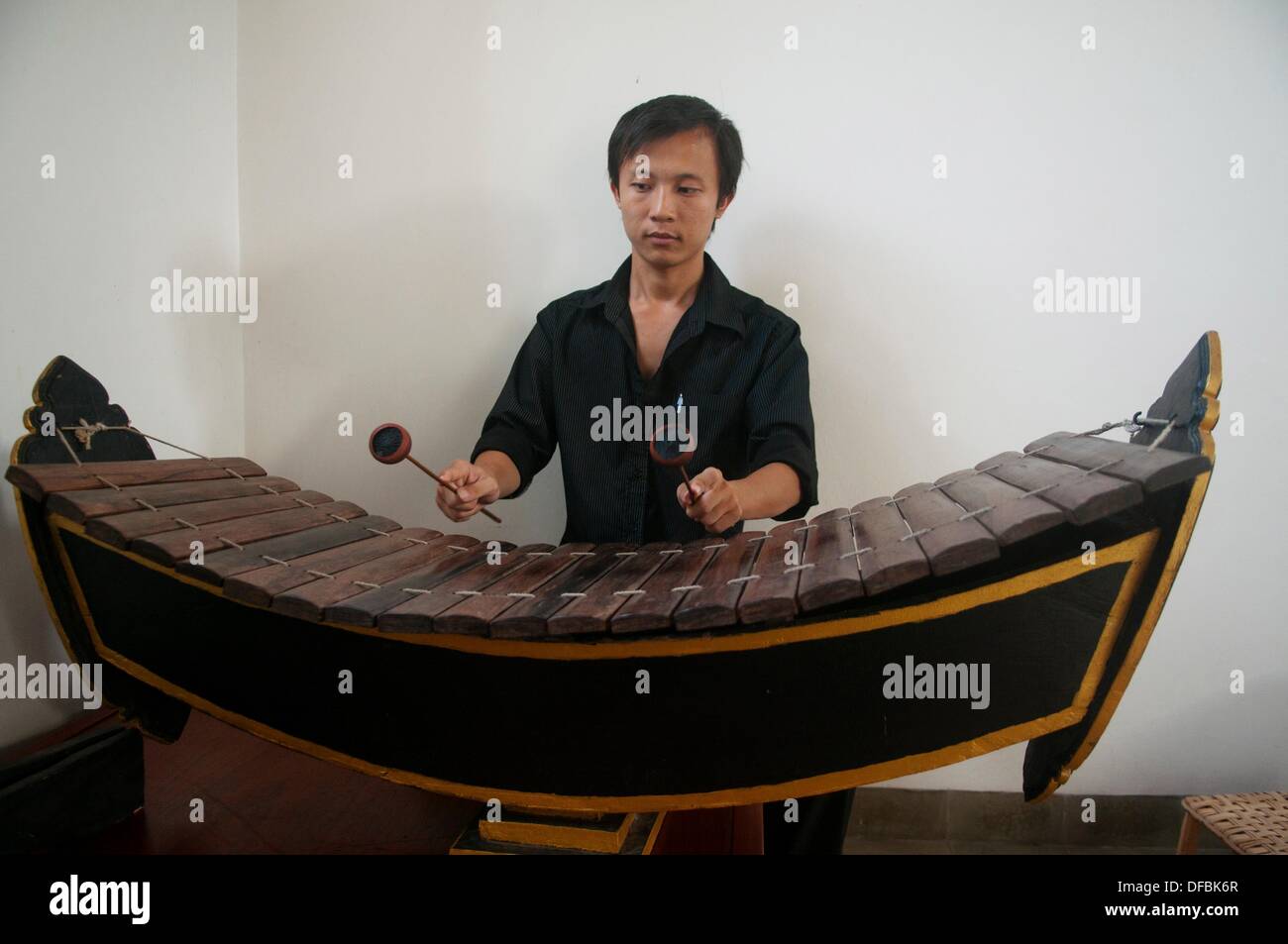 musician playing his traditional instrument in Luang Prabang, Laos ...