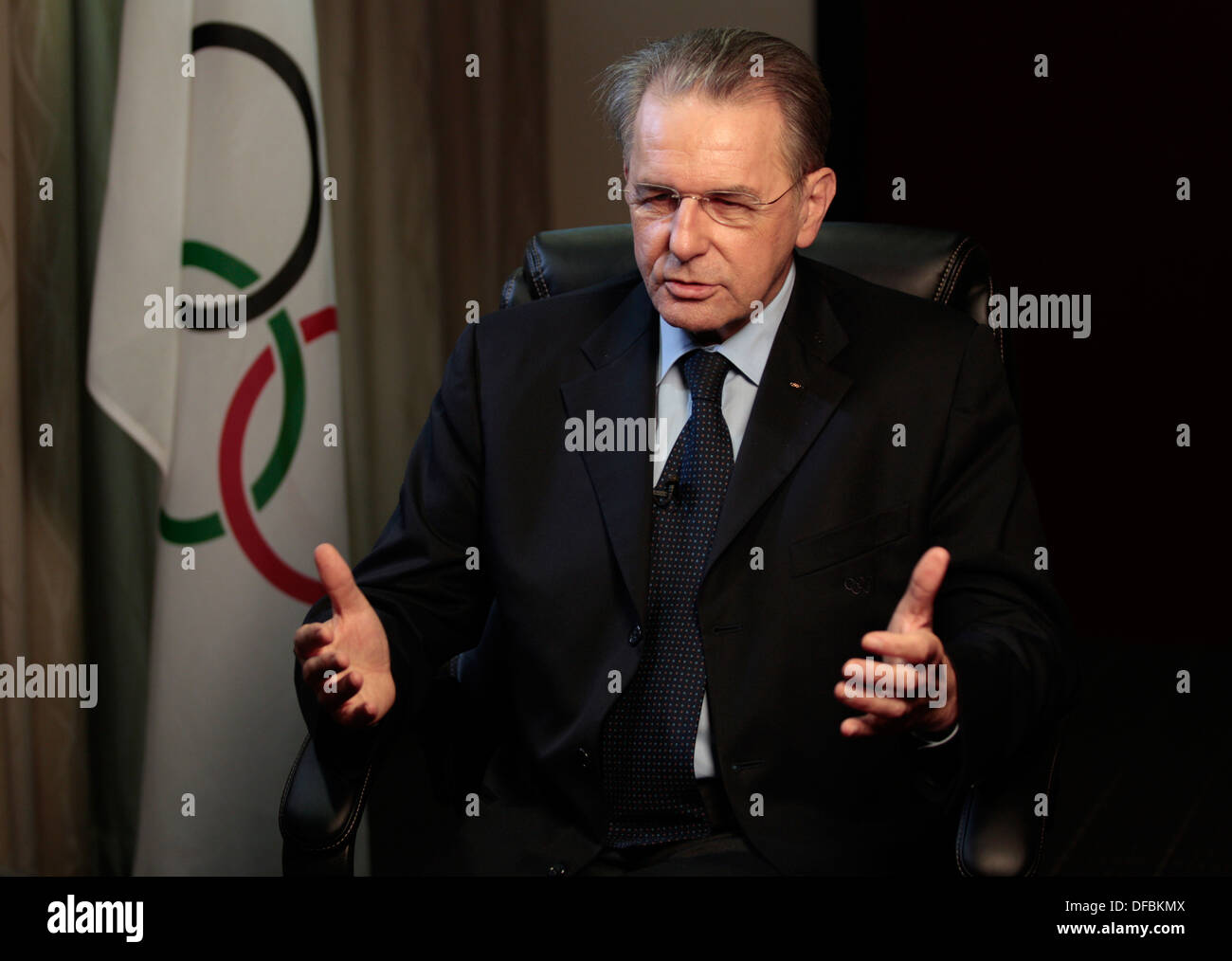 IOC President Jacques Rogge is photographed an interview during his ...