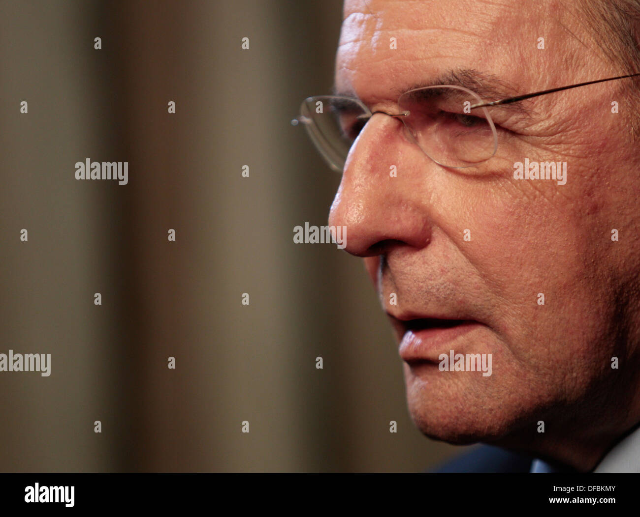 IOC President Jacques Rogge is photographed an interview during his ...