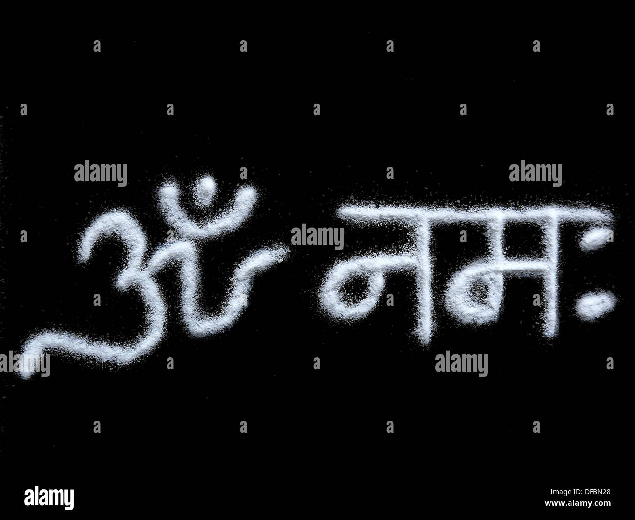 A holy sign or letter called Om Namah is made by powder which is made ...