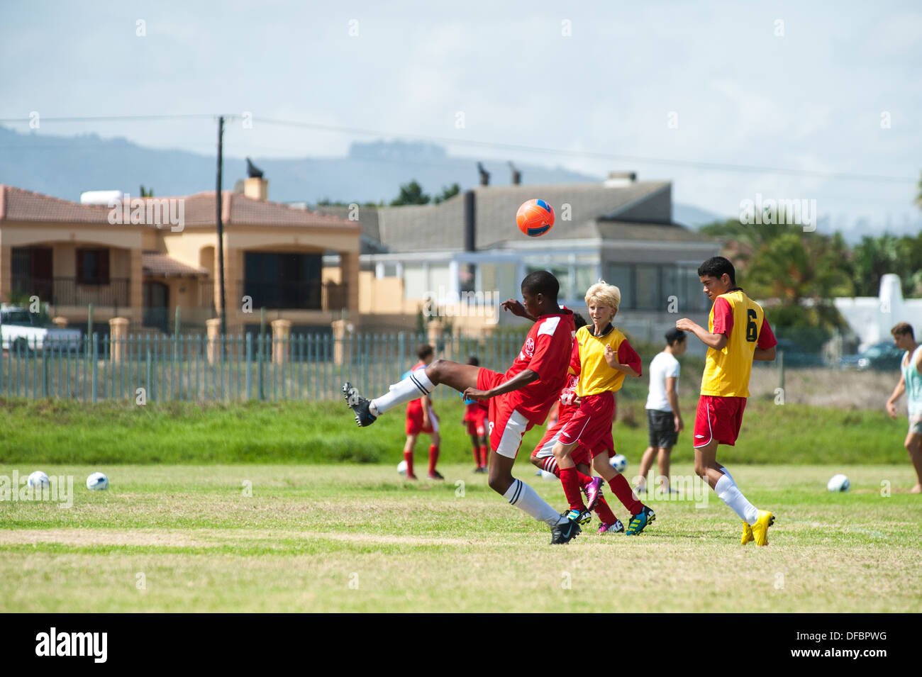 Junior football players chasing the ball, Cape Town, South Africa Stock ...