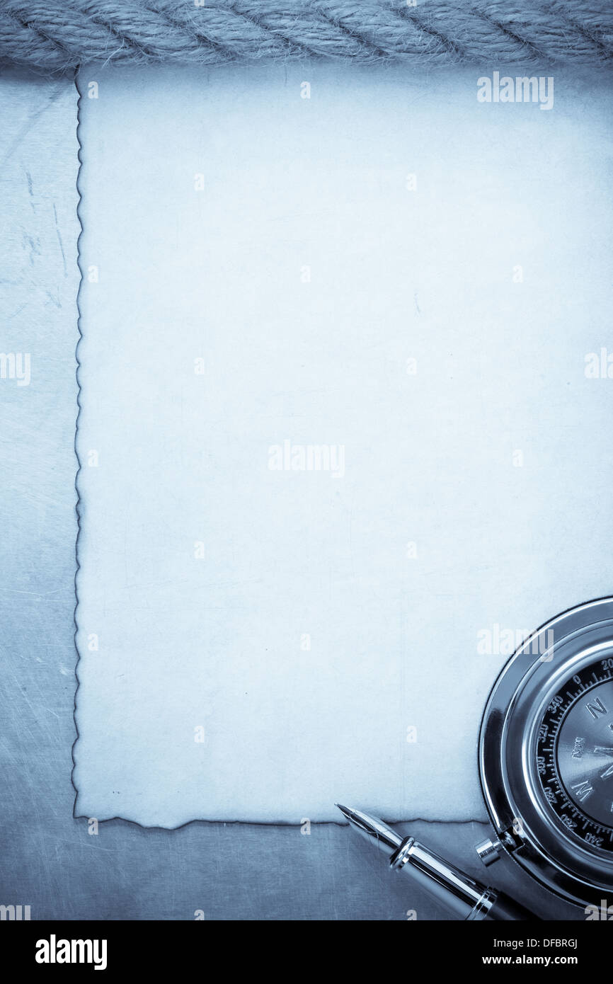 parchment and compass with ship rope Stock Photo - Alamy