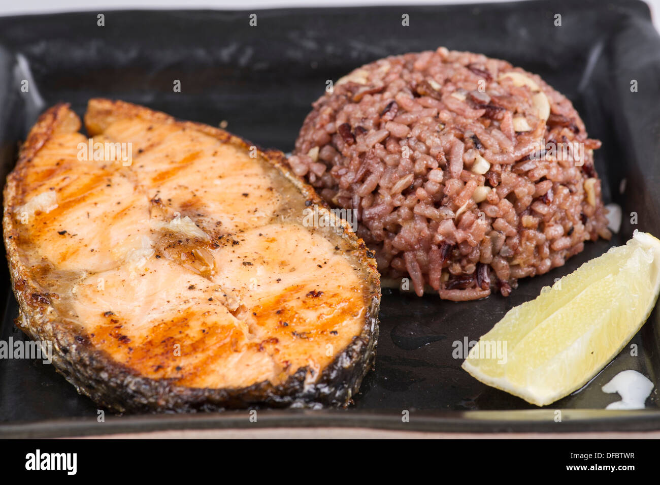 Fried fish with rice Stock Photo - Alamy