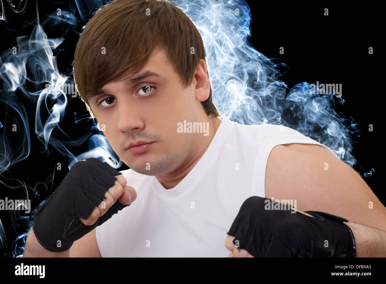Portrait of the young fighter in a smoke Stock Photo - Alamy
