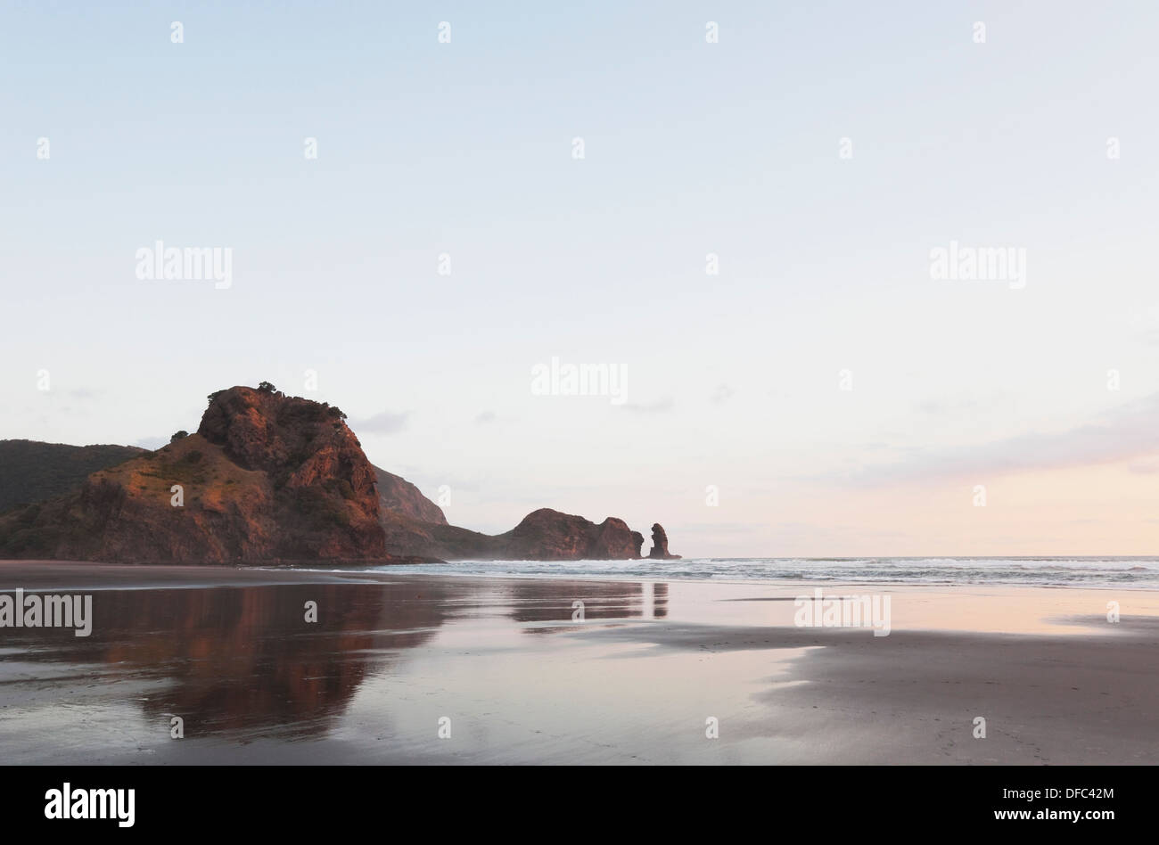 New Zealand, View of Famous Lion Rock and Nun Rock at Piha Beach Stock ...