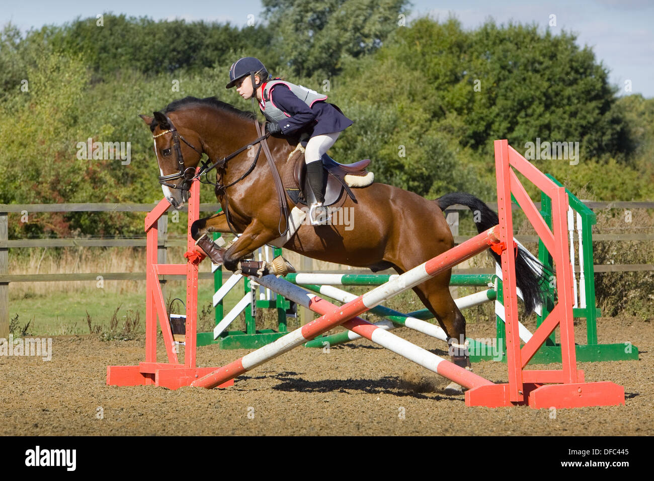 Girl horse jumping hi-res stock photography and images - Alamy