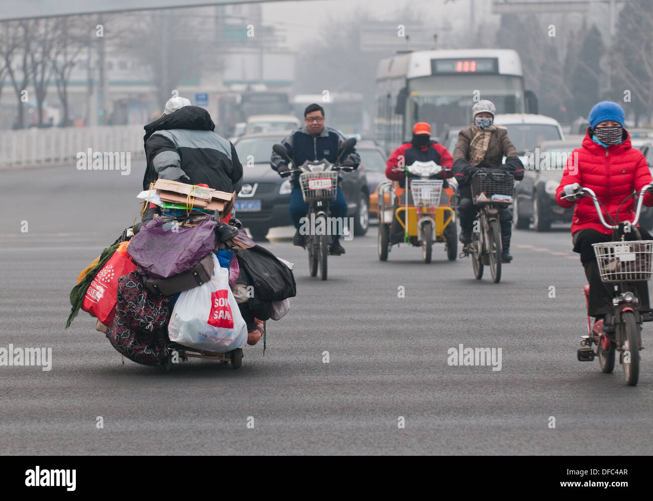 homeless Chinese man pulling his trolley in Beijing, China Stock Photo ...