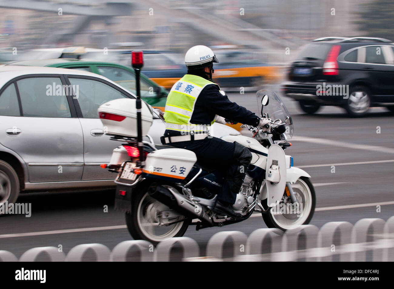 Chinese policeman on motorbike in Beijing, China Stock Photo - Alamy