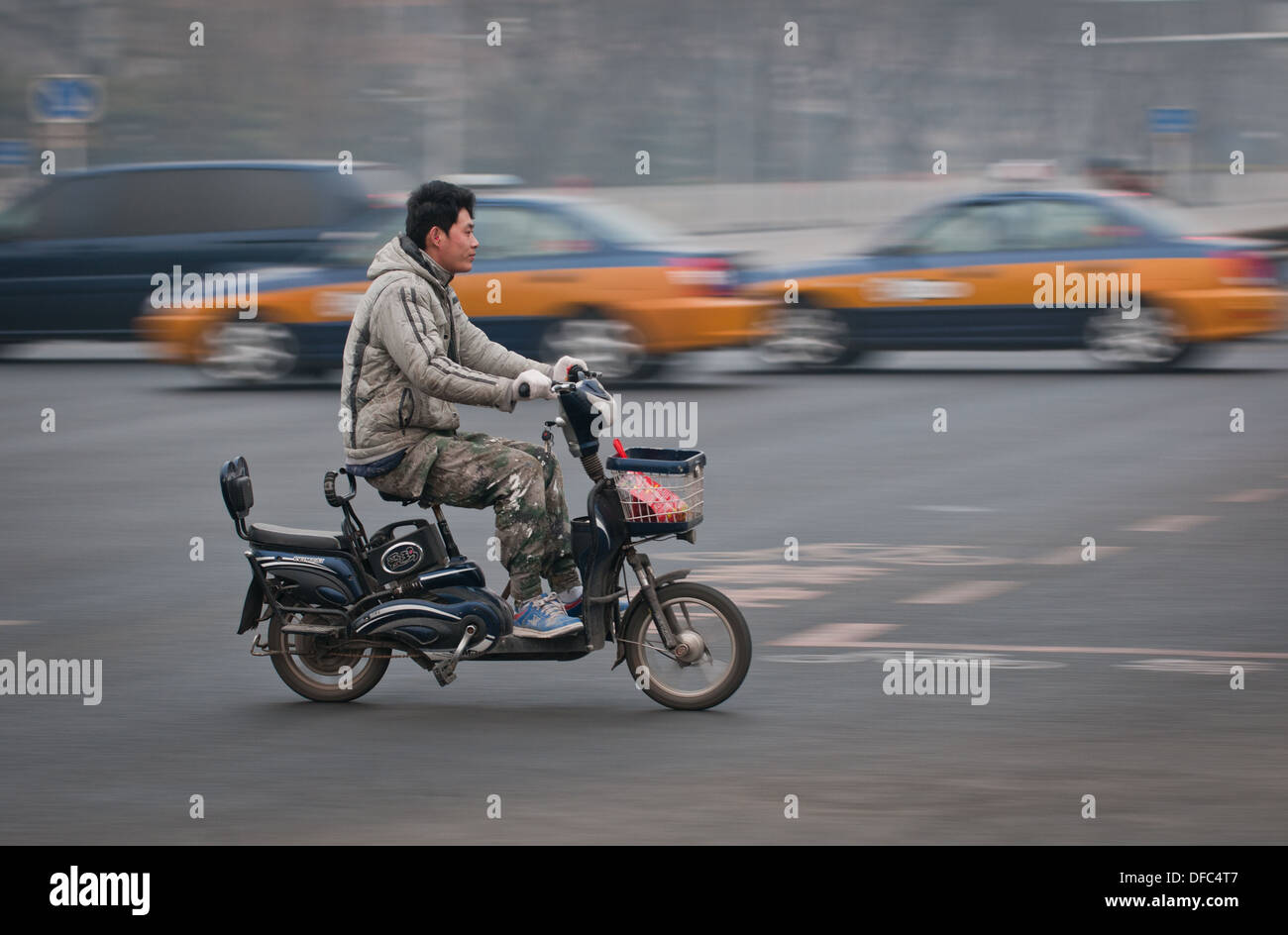Young Man On Moped Stock Photos & Young Man On Moped Stock Images - Alamy