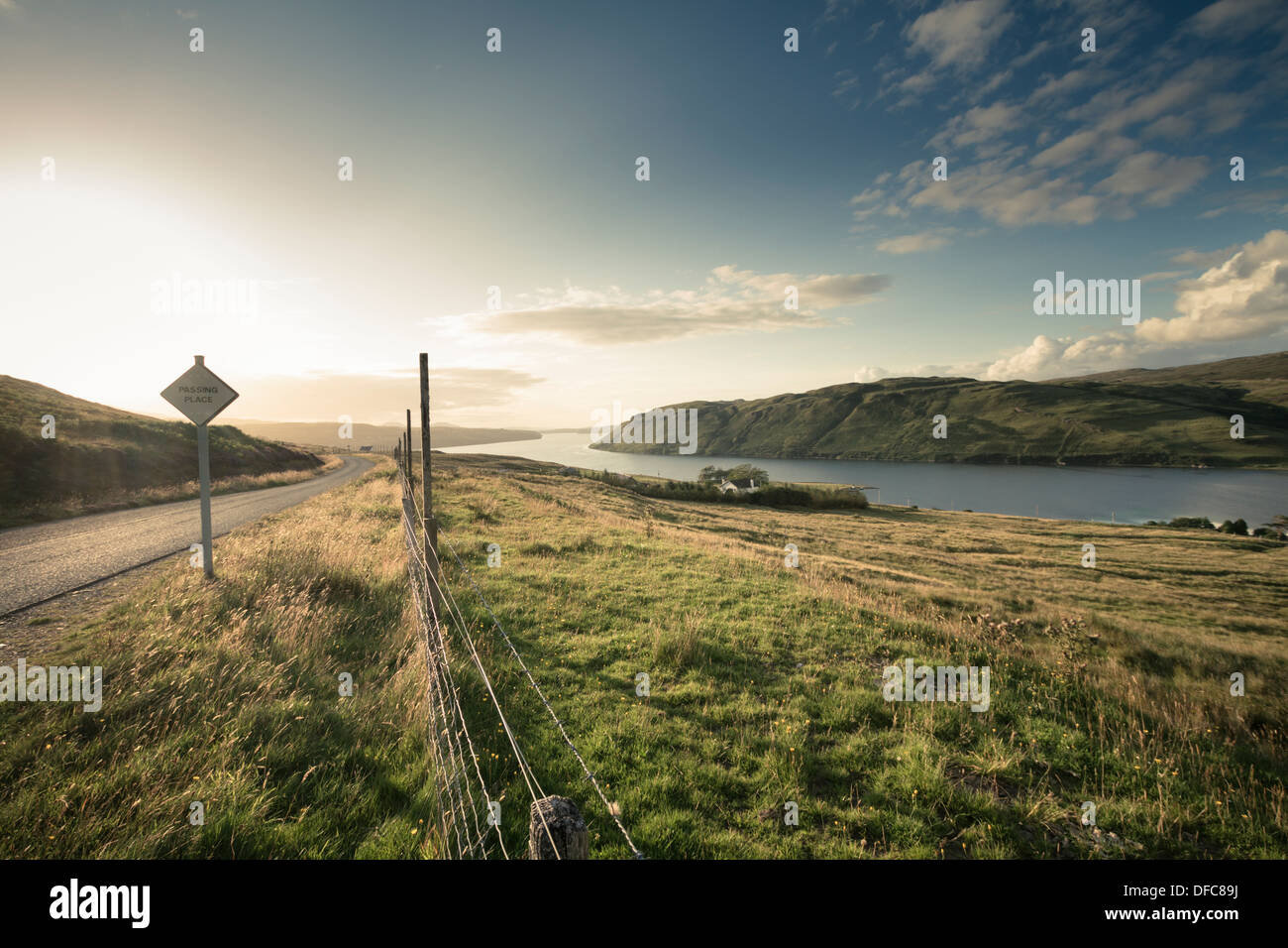 Scotland, View of street with road sign and fence Stock Photo - Alamy