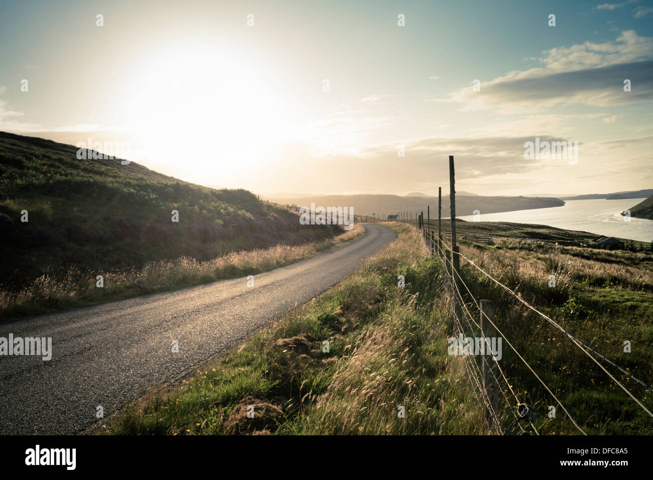 Scotland, View of street with road sign and fence Stock Photo - Alamy
