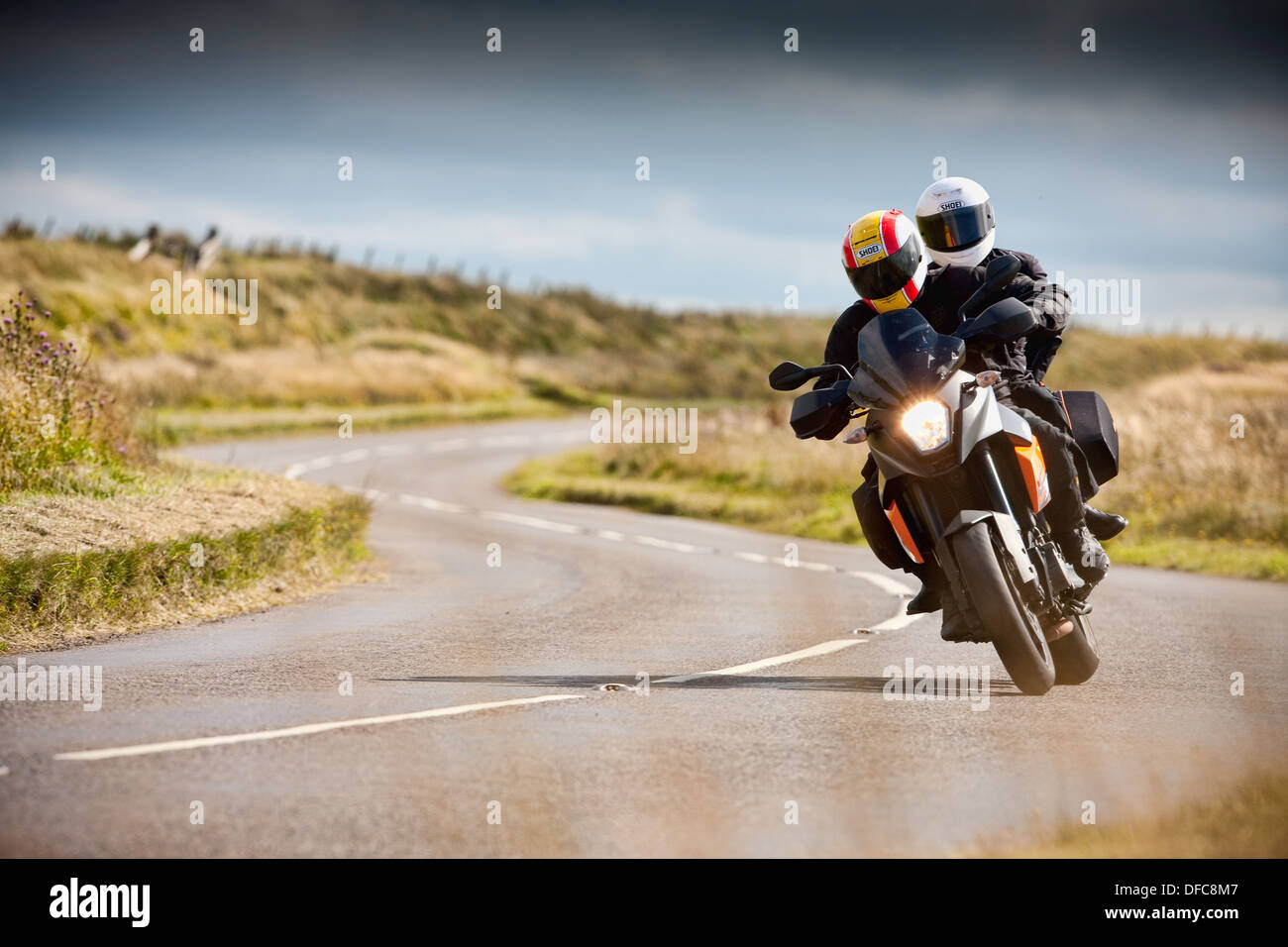 Biker couple on a KTM touring through England Stock Photo - Alamy